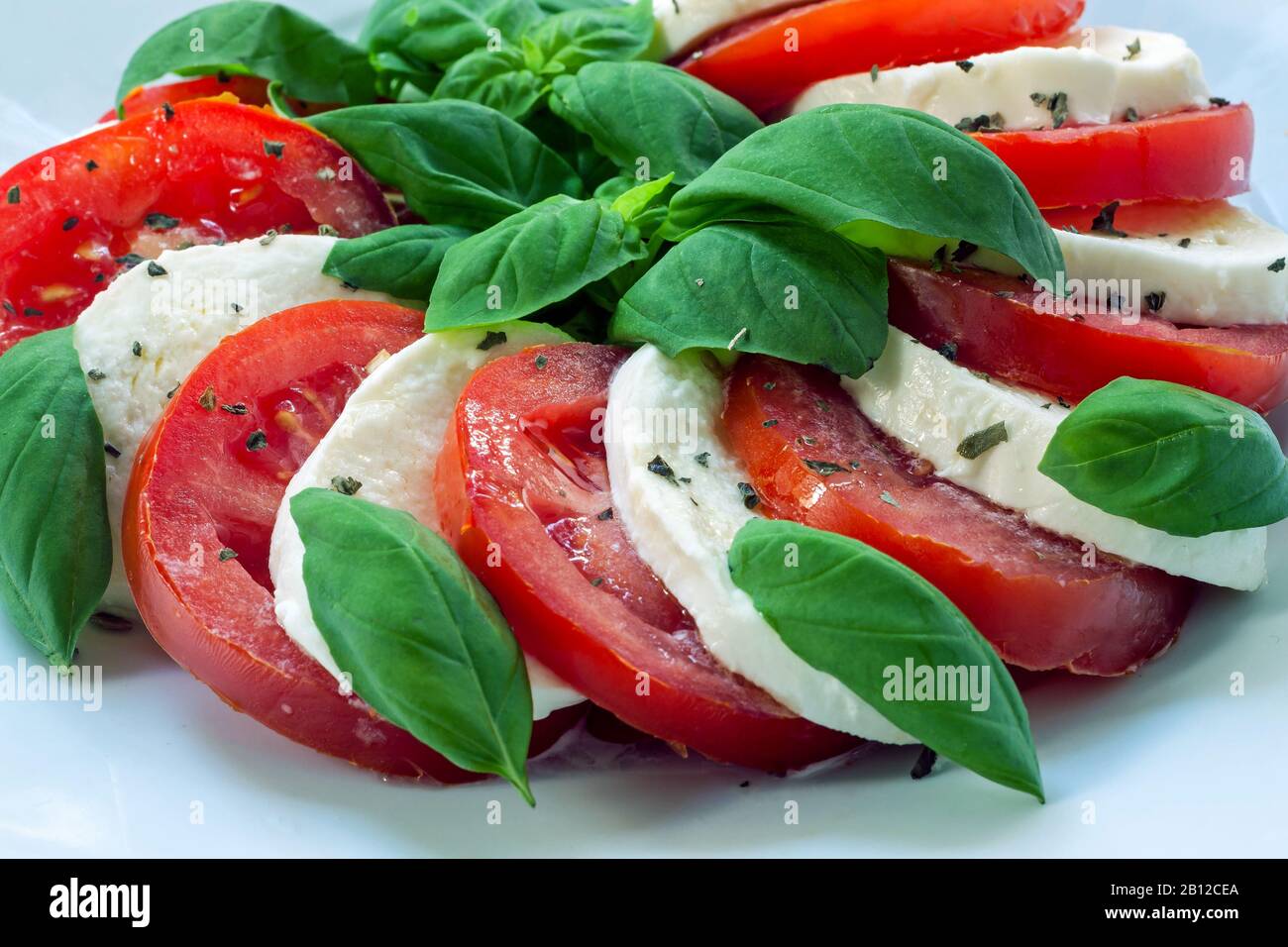 caprese - italian food with background Stock Photo - Alamy