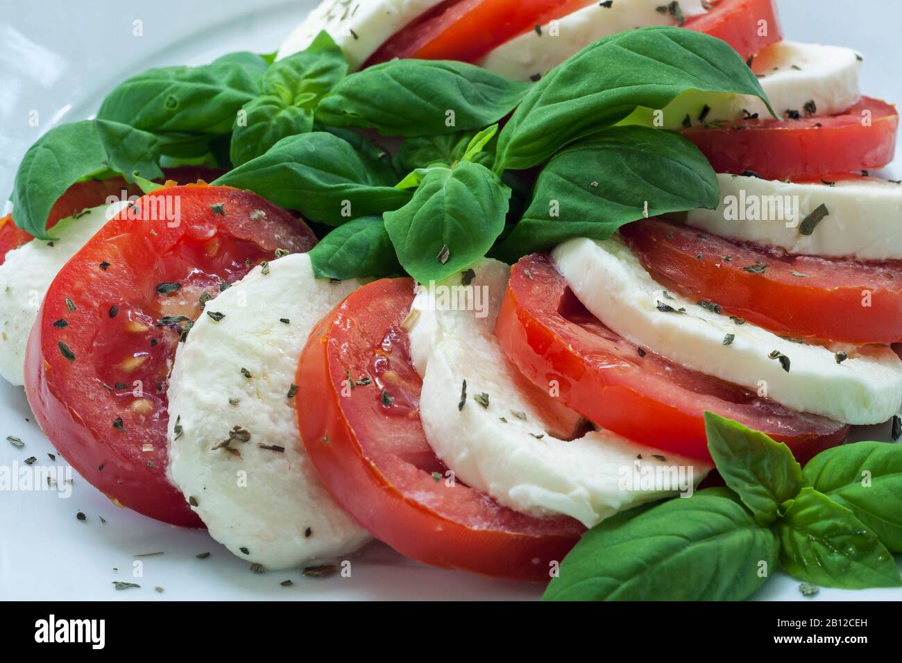 caprese - italian food with background Stock Photo - Alamy