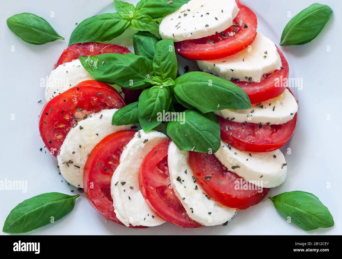 caprese - italian food with background Stock Photo - Alamy