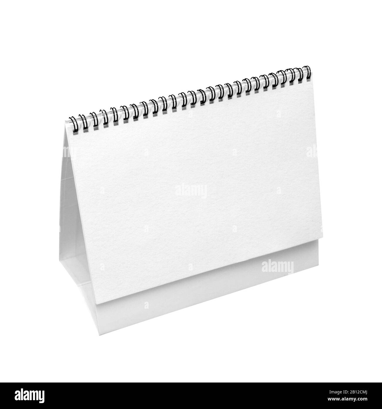 Blank real paper desk spiral calendar isolated on white background ...