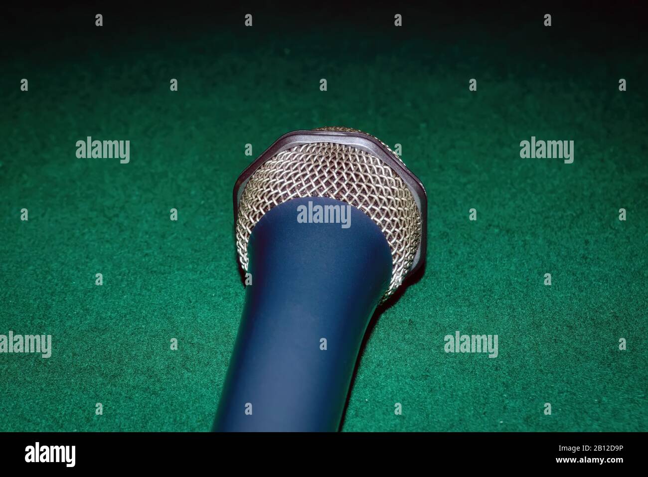 Modern microphone on color background. Vocal microphone on a background ...