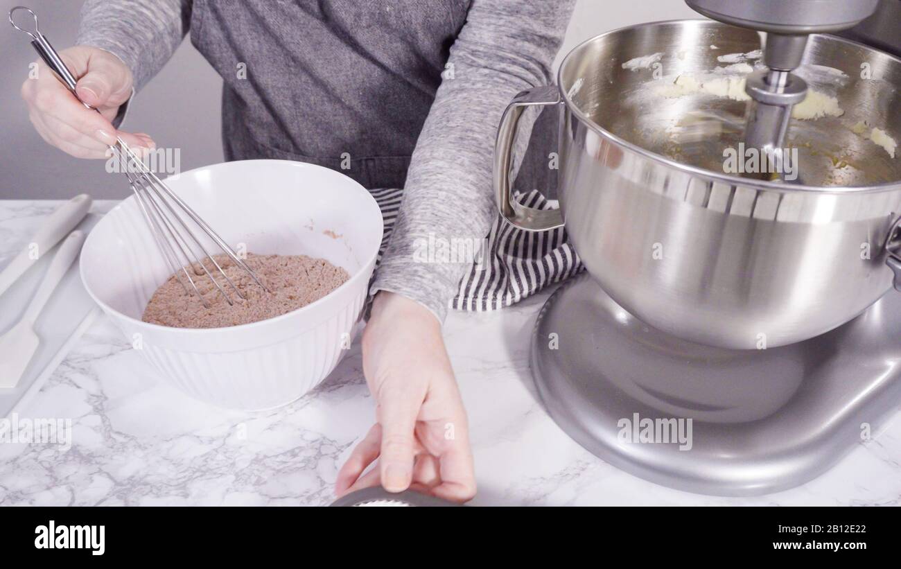 Making red velvet cupcakes mixing hi-res stock photography and images ...