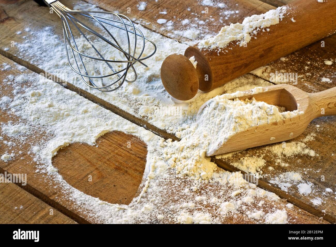 flour, rolling pin and heart with wood background Stock Photo - Alamy