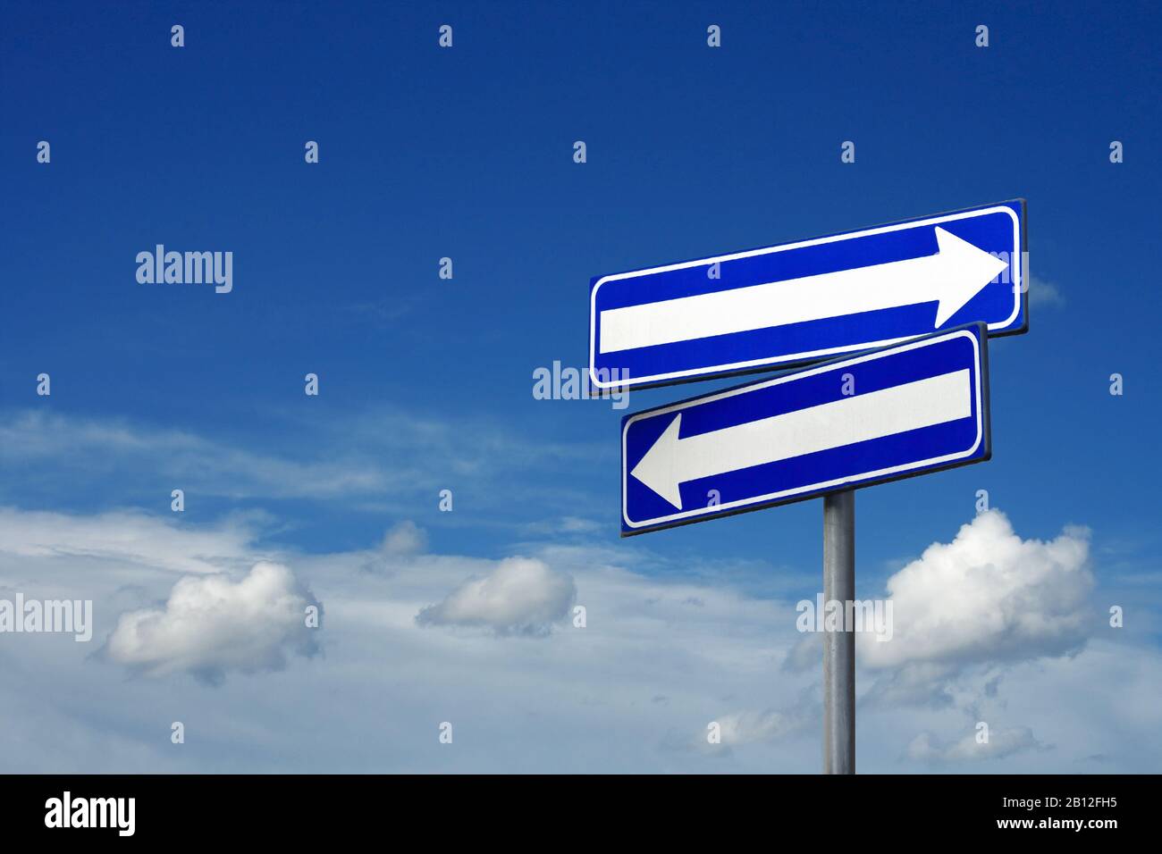 sign double way - blue sky Stock Photo - Alamy