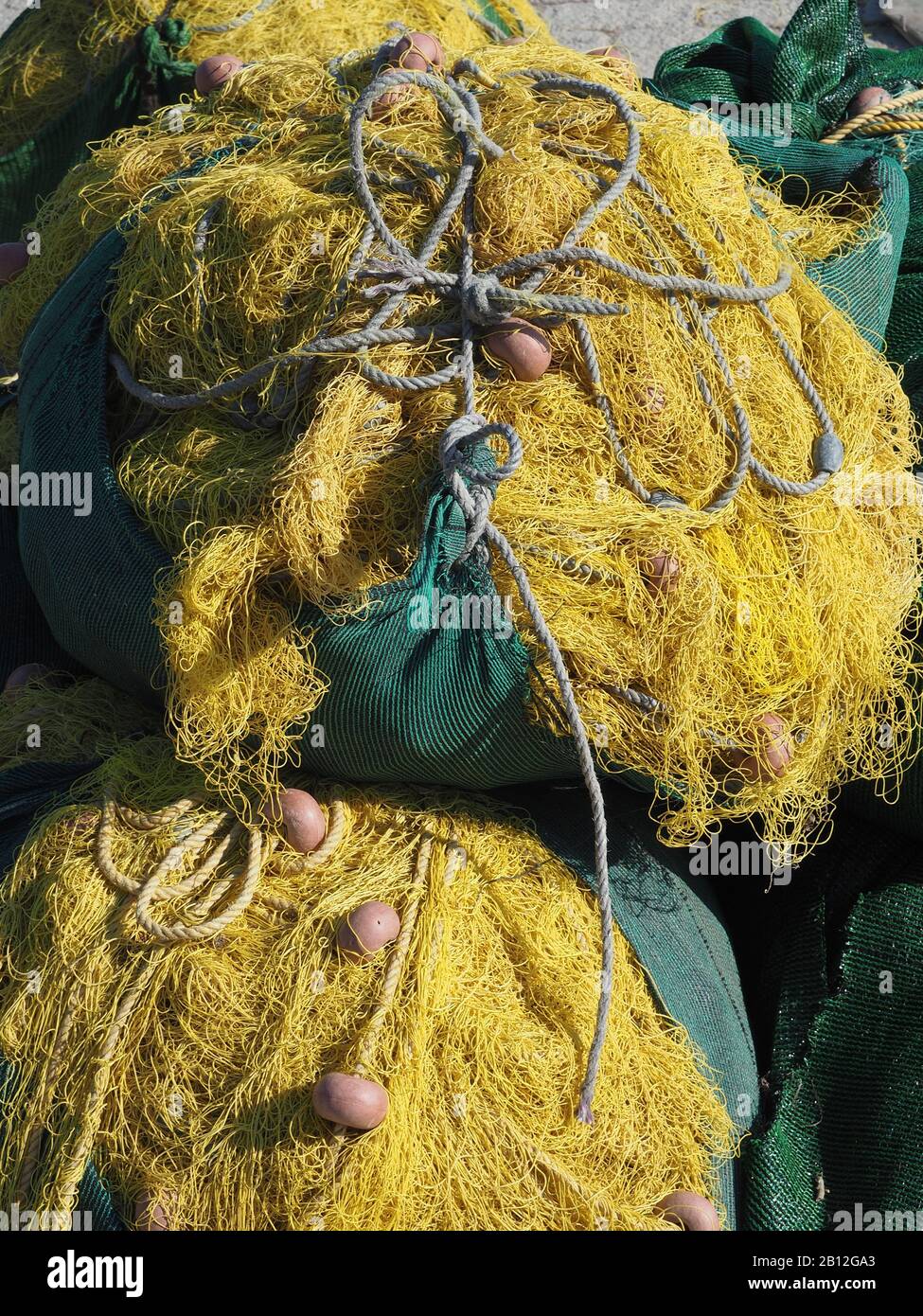 Red Yellow And Green Fishing Nets High Resolution Stock Photography and ...