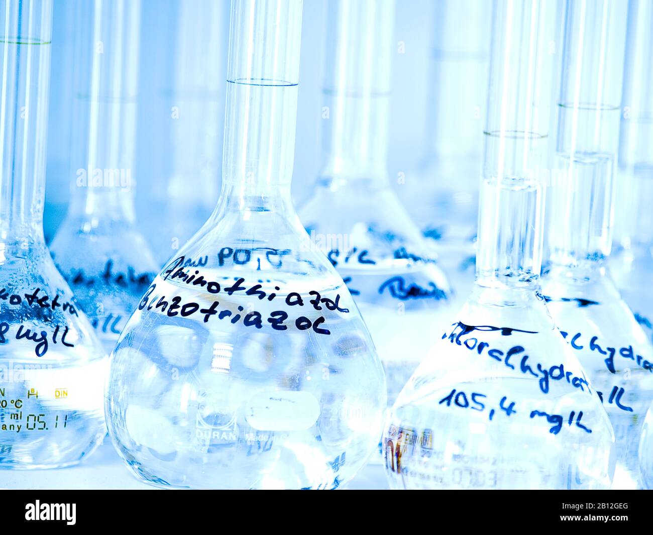Measuring flasks in laboratory Stock Photo - Alamy