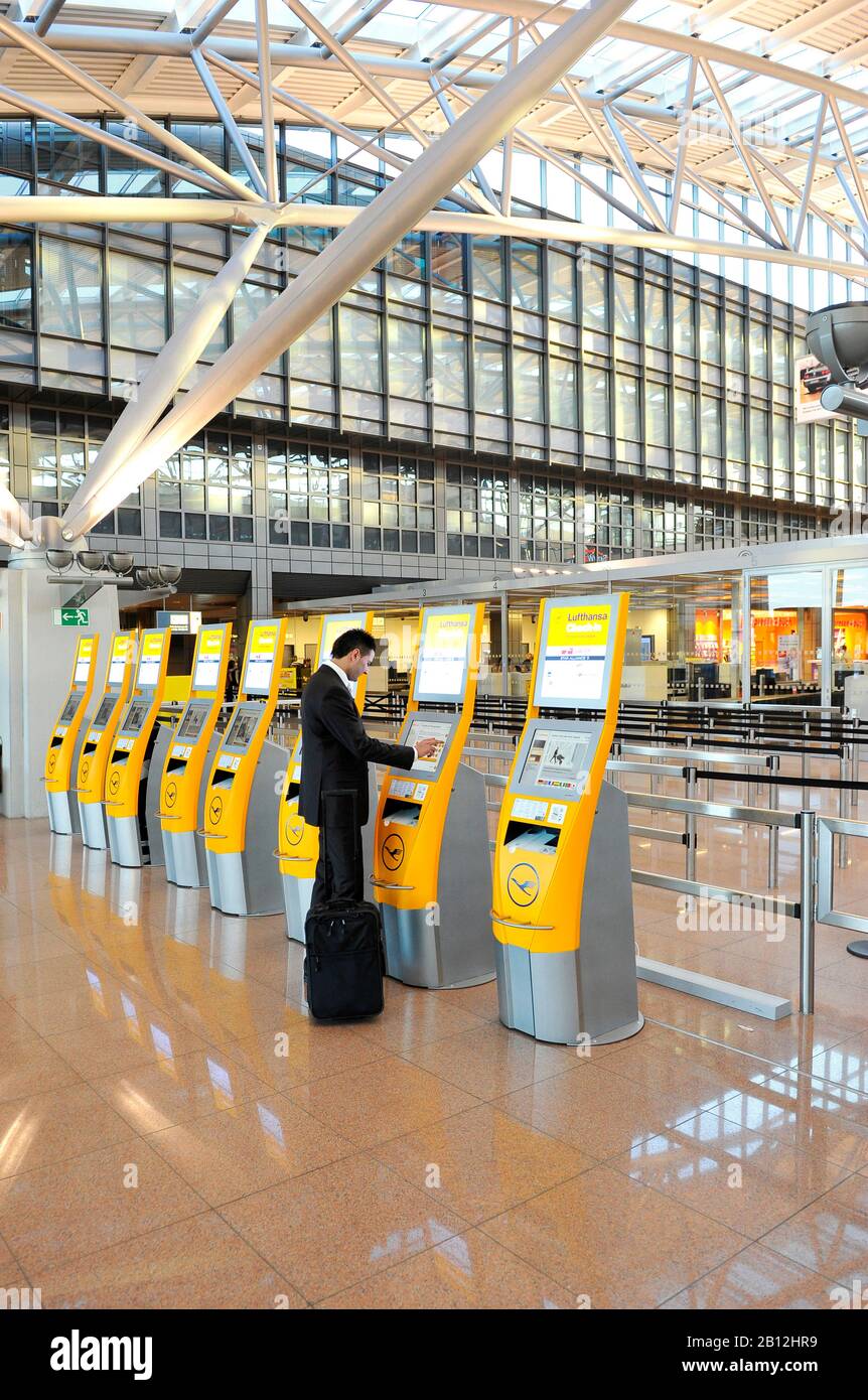 Automated check-in terminals from Lufthansa and a young,self-confident ...