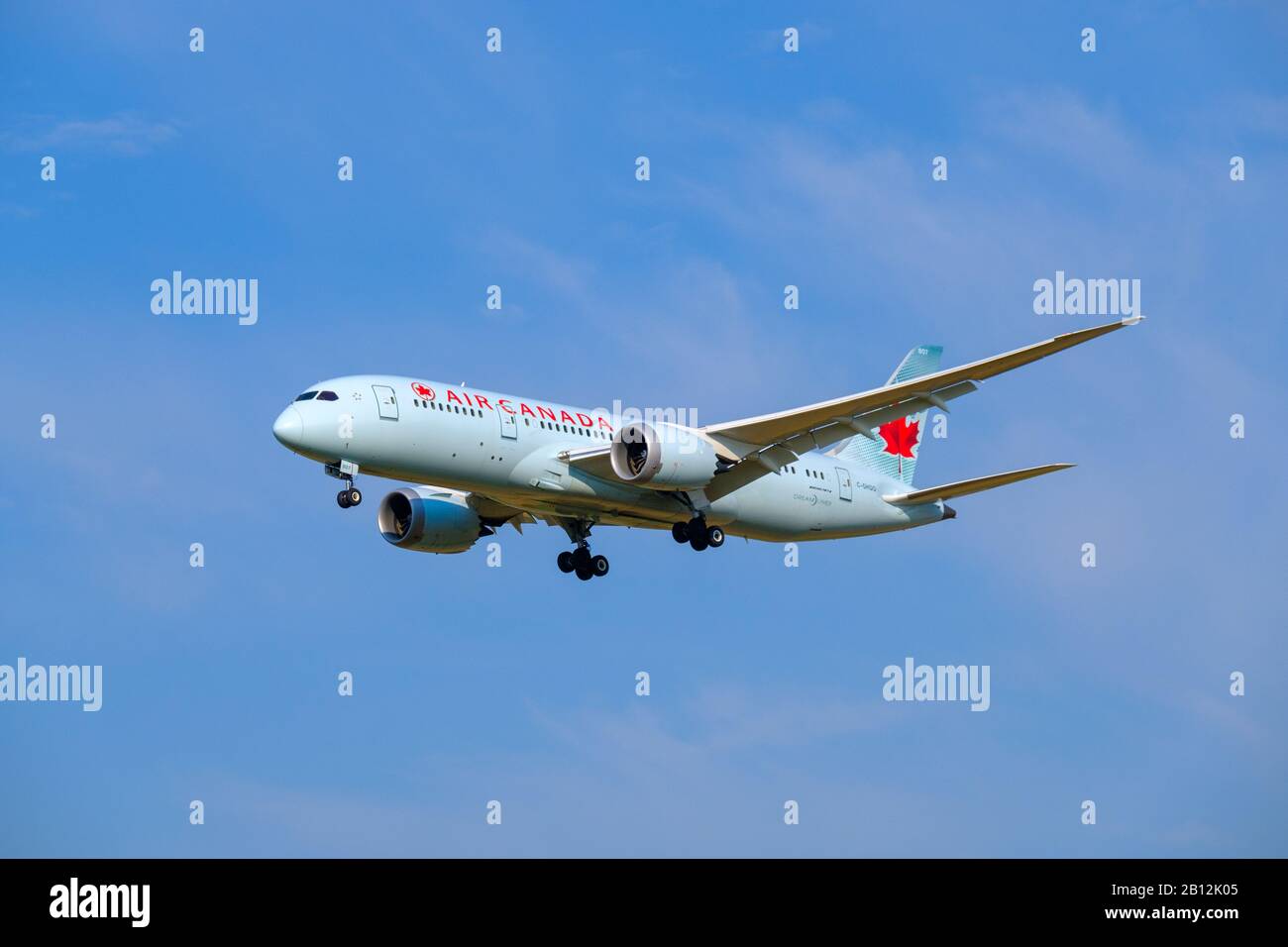 Air Canada airlines airplane preparing for landing at day time in ...