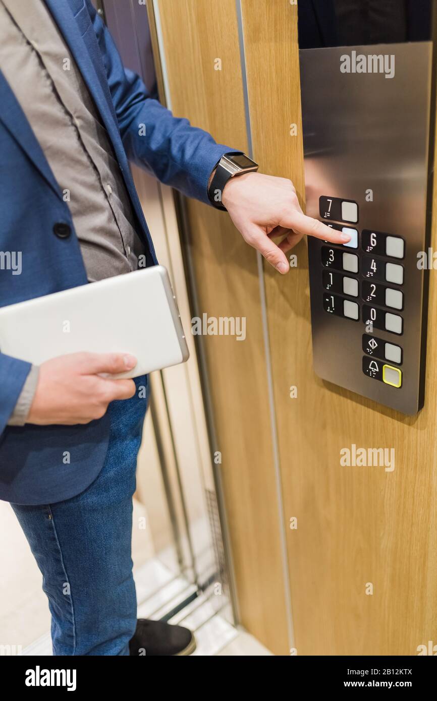 Pressing Elevator Button High Resolution Stock Photography and Images ...