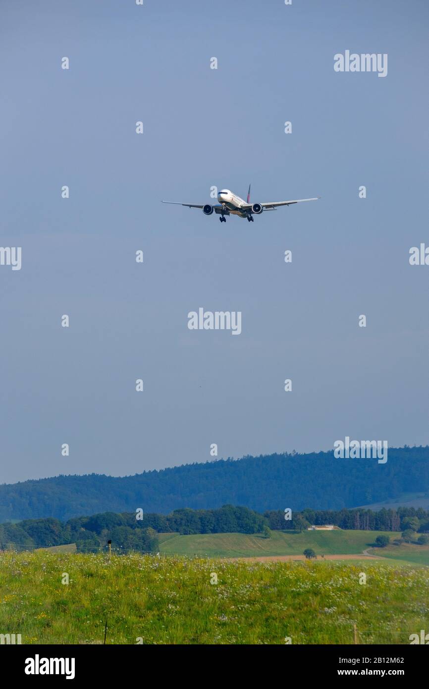 Airplane flying above forest hi-res stock photography and images - Alamy