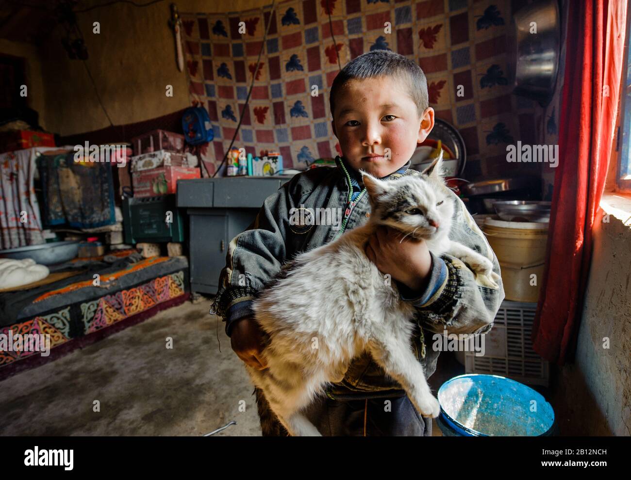 Kids in remote xinjiang have very few possesions and pets are their ...