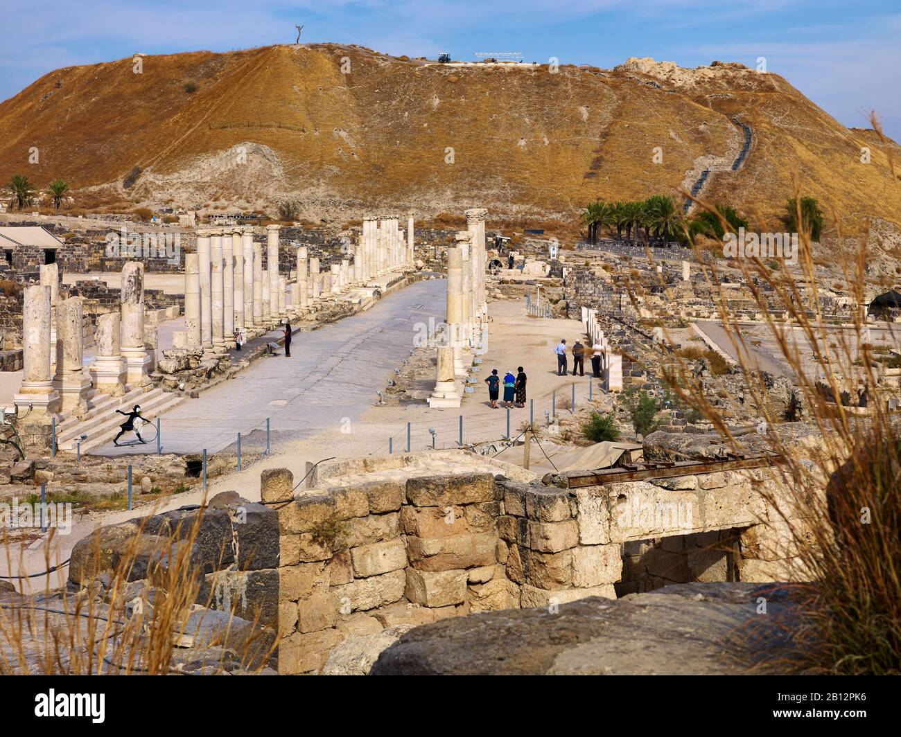 Palladius street of ancient city Bet She'an with Tell in the Jordan ...