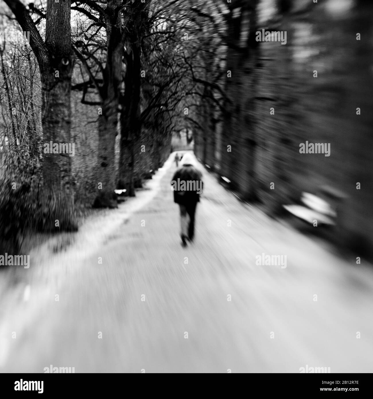 Person going for a walk park Black and White Stock Photos & Images - Alamy