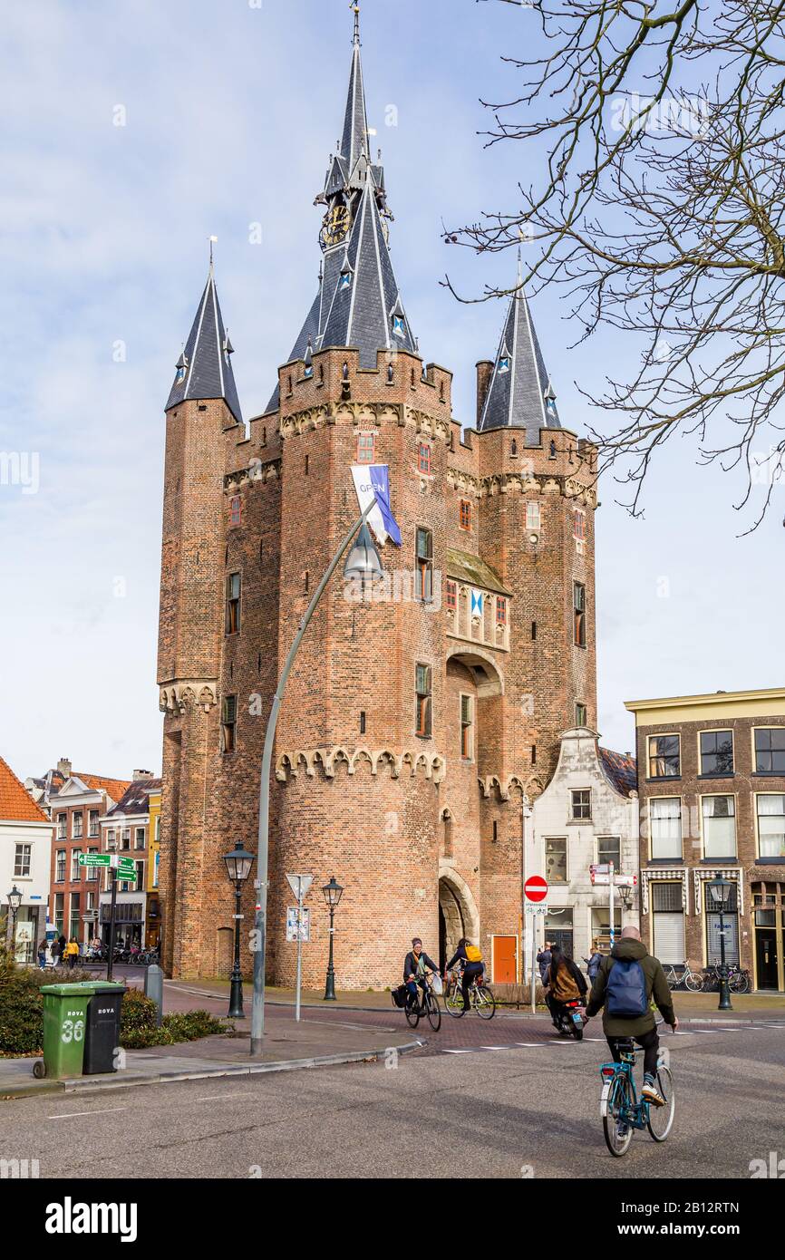 Zwolle, Netherlands, February 21, 2020: People crossing city gate ...