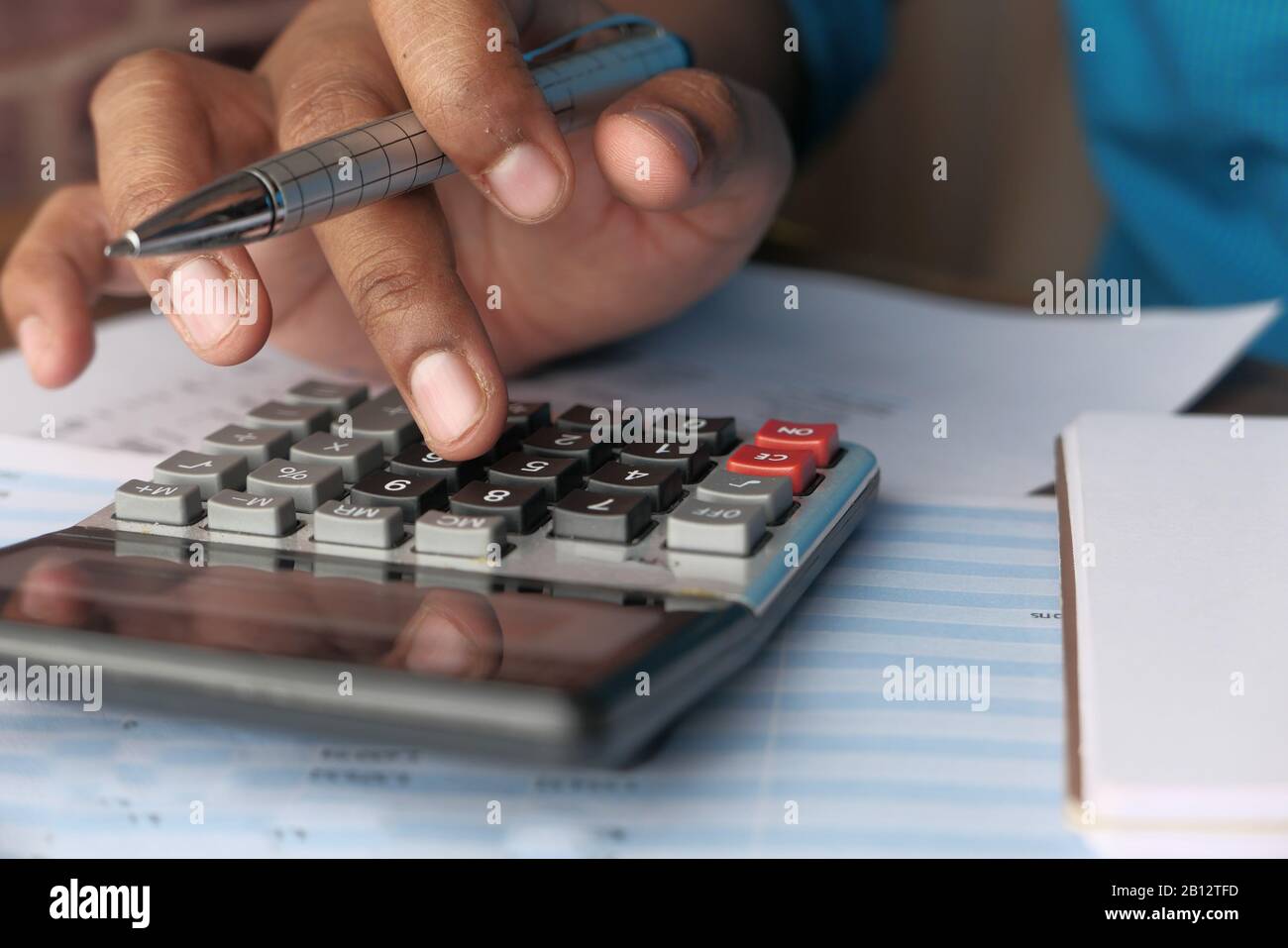 Calculating payments hi-res stock photography and images - Alamy