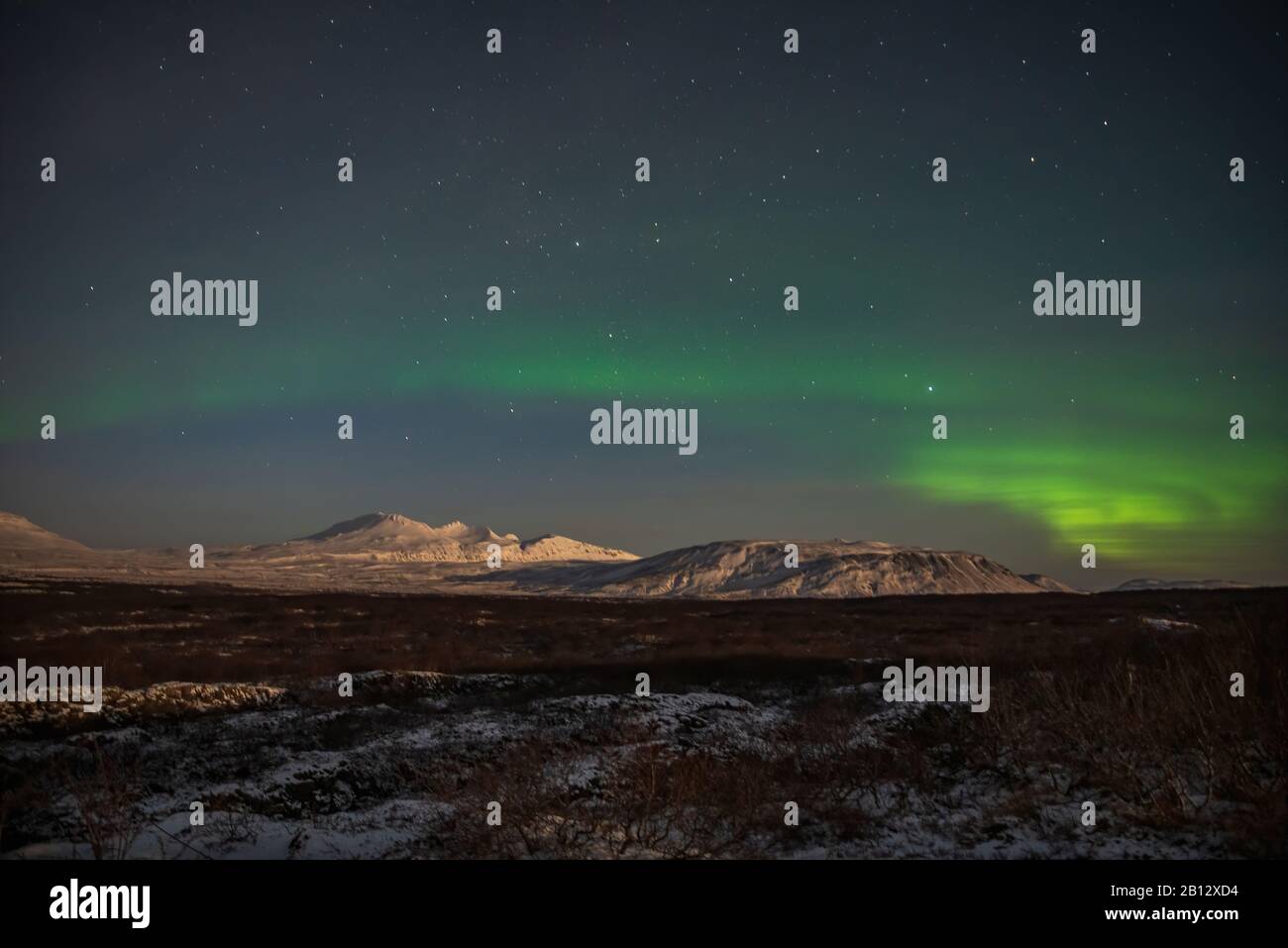 Northern lights in the night sky of Iceland Stock Photo - Alamy