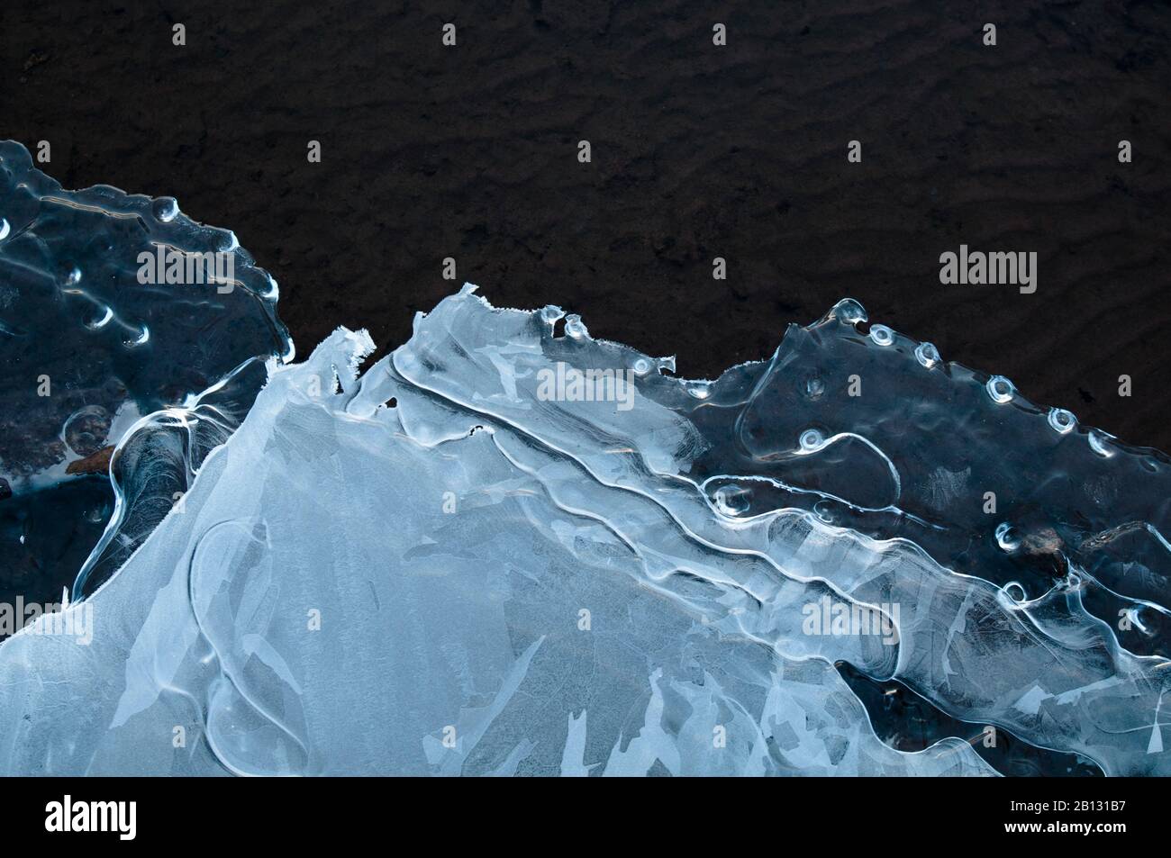 Ice over water Stock Photo - Alamy