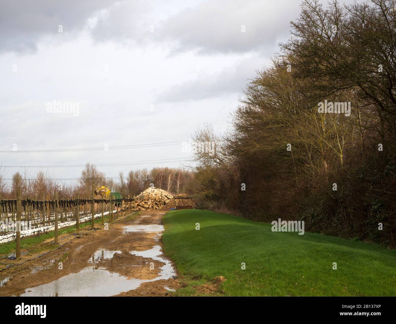 Man made mounds of earth in rural setting Stock Photo - Alamy