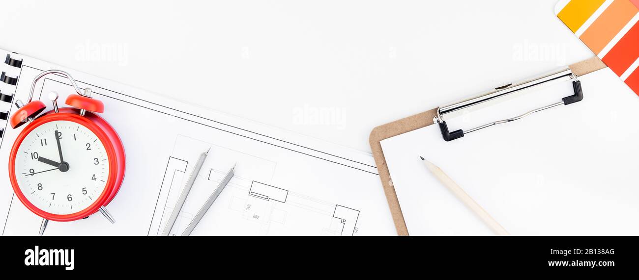 Creative flat lay overhead top view blueprint flat project plan alarm ...