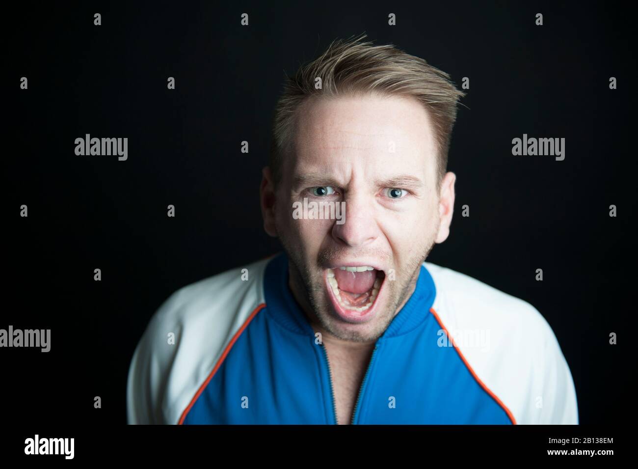 Shouting casual man standing hi-res stock photography and images - Alamy