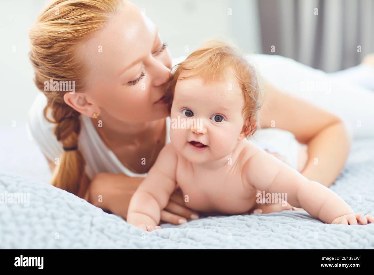 Newborn lying on mum hi-res stock photography and images - Alamy