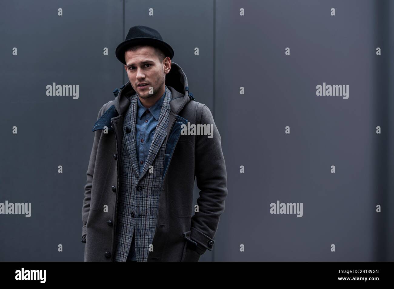 Man overcoat hat hi-res stock photography and images - Alamy