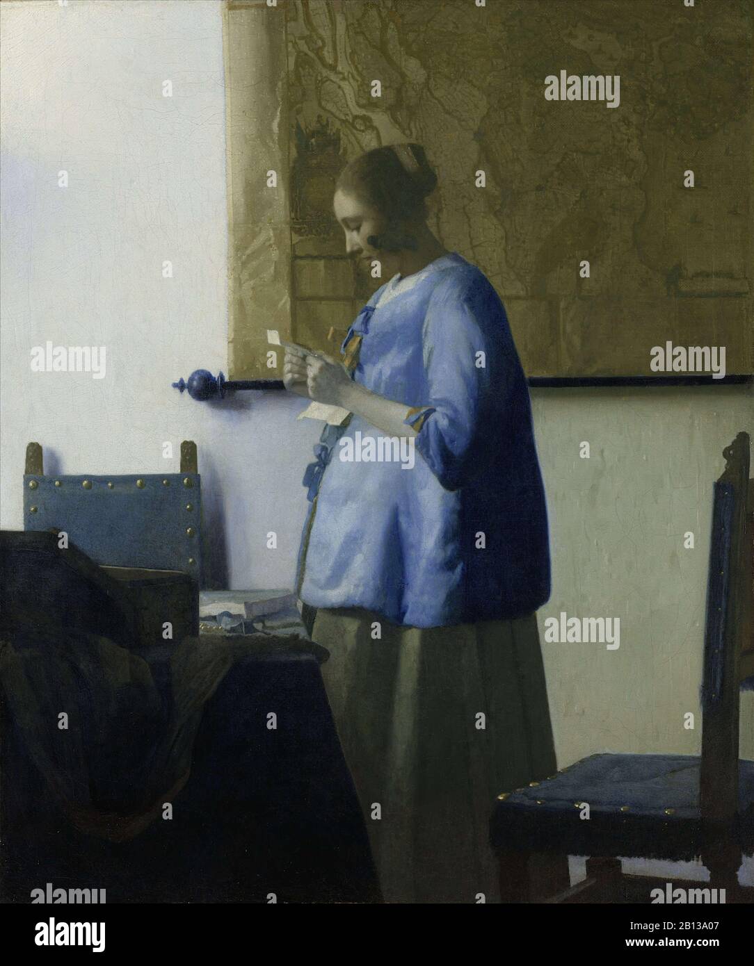 Woman in Blue Reading a Letter (circa 1663) by Johannes Vermeer - 17th ...