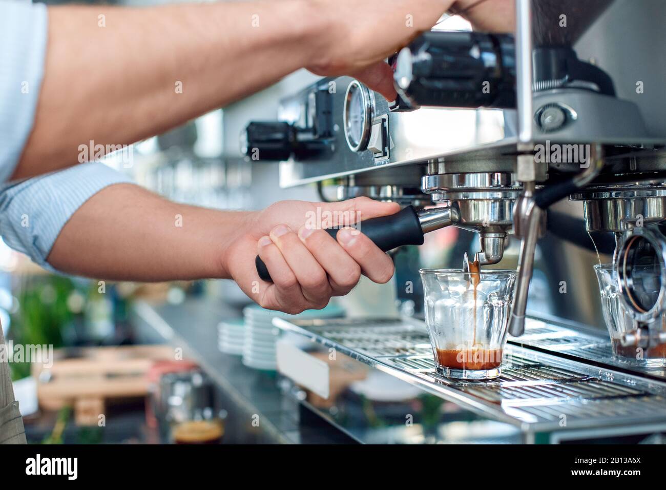 Barista espresso machine making man employee worker working hi-res ...