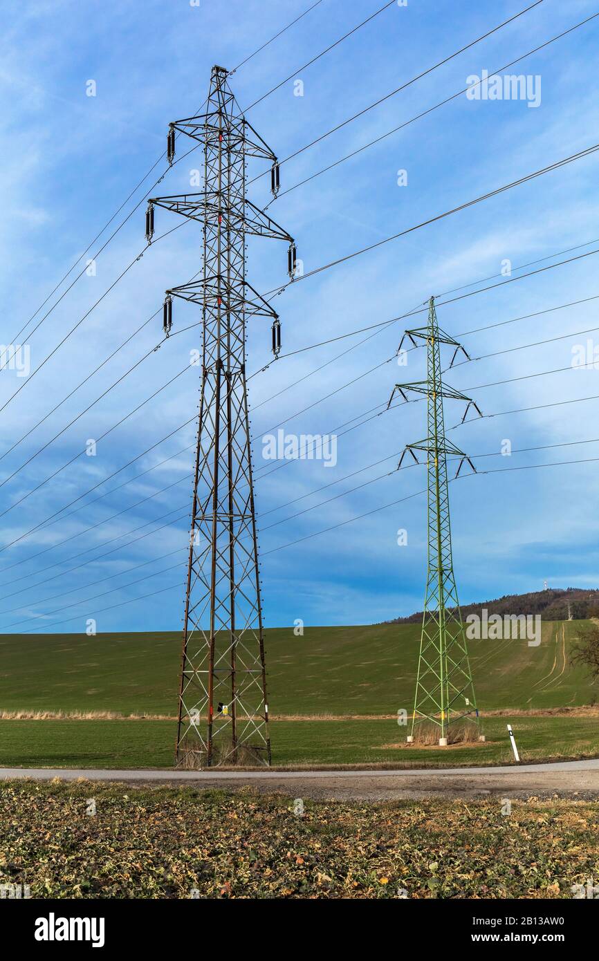 Power lines in the fields. Energy transfer. Distribution of electricity ...