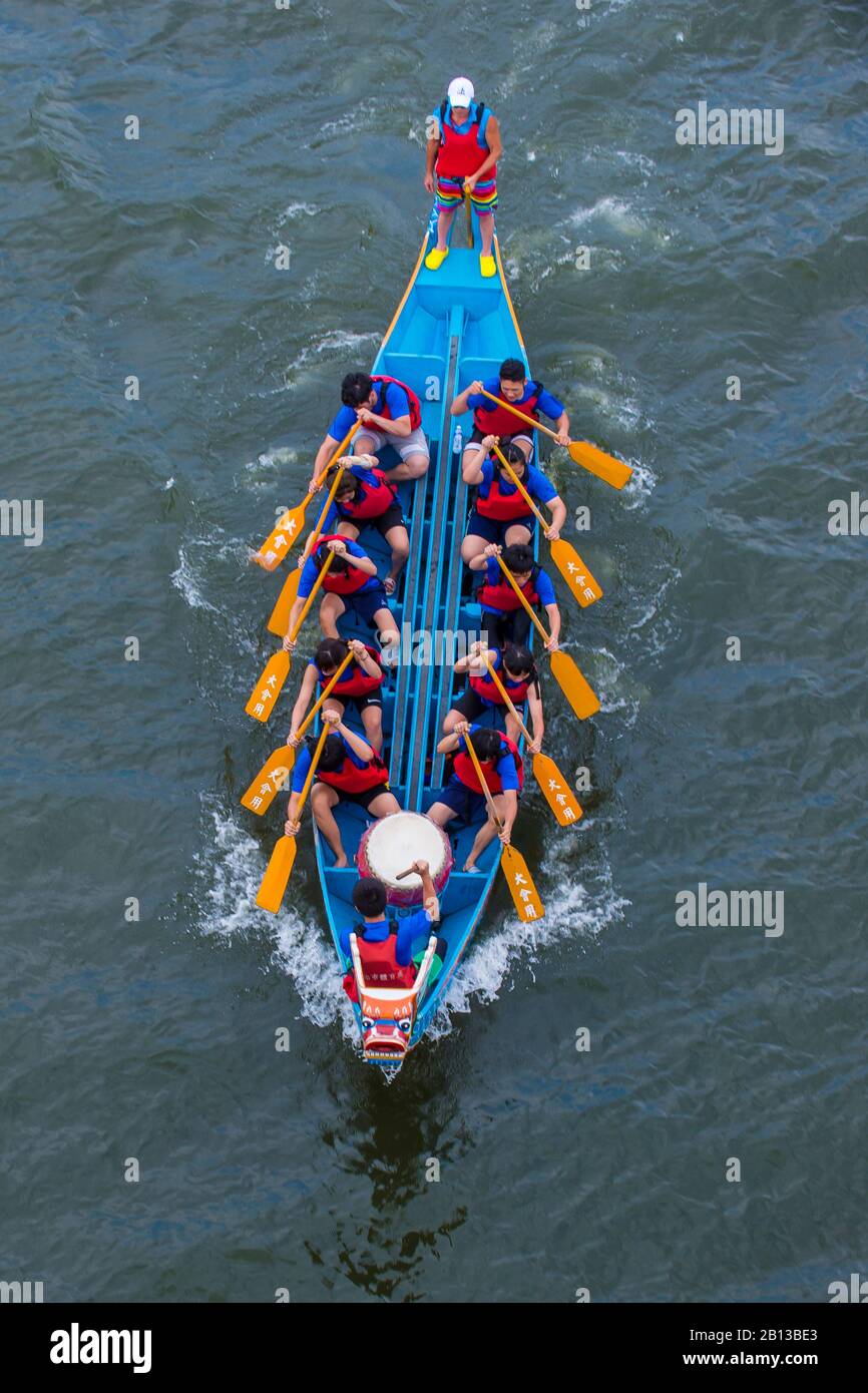 Dragonboat team racing during the 2019 Taipei Dragon Boat festival in ...