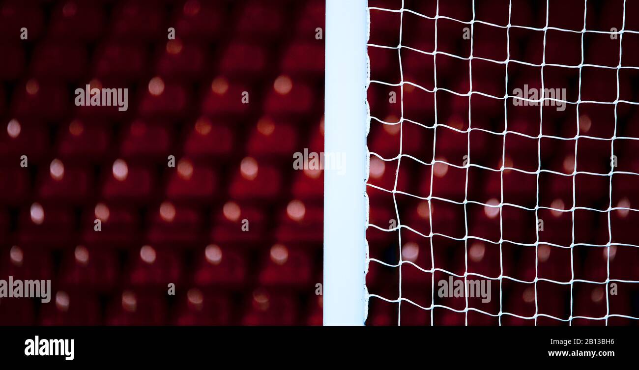 The soccer field view through white square gate net. Football sport ...