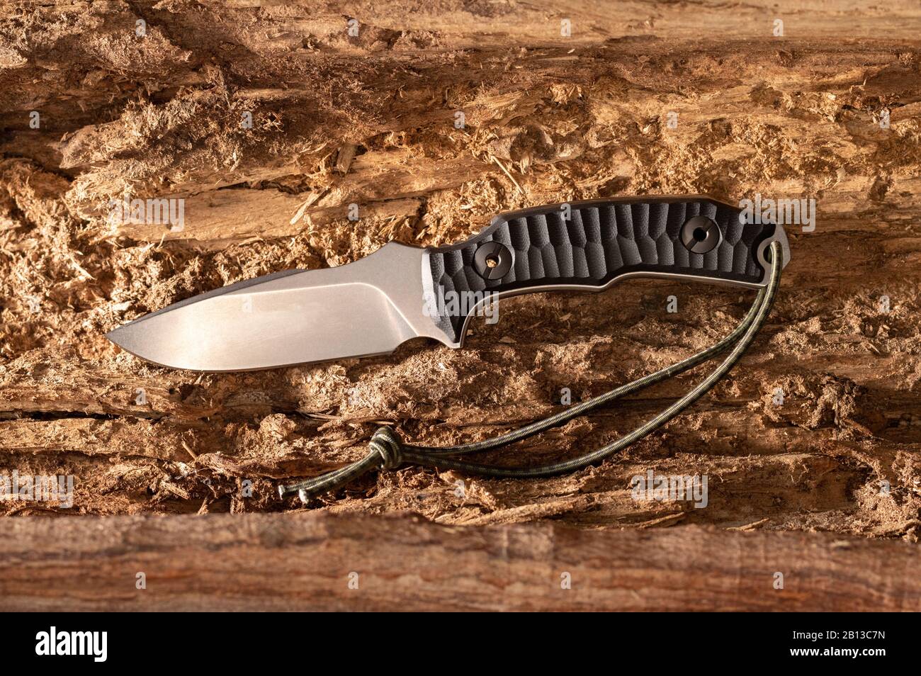 A knife in the middle of a tree. Knife and wooden texture Stock Photo ...