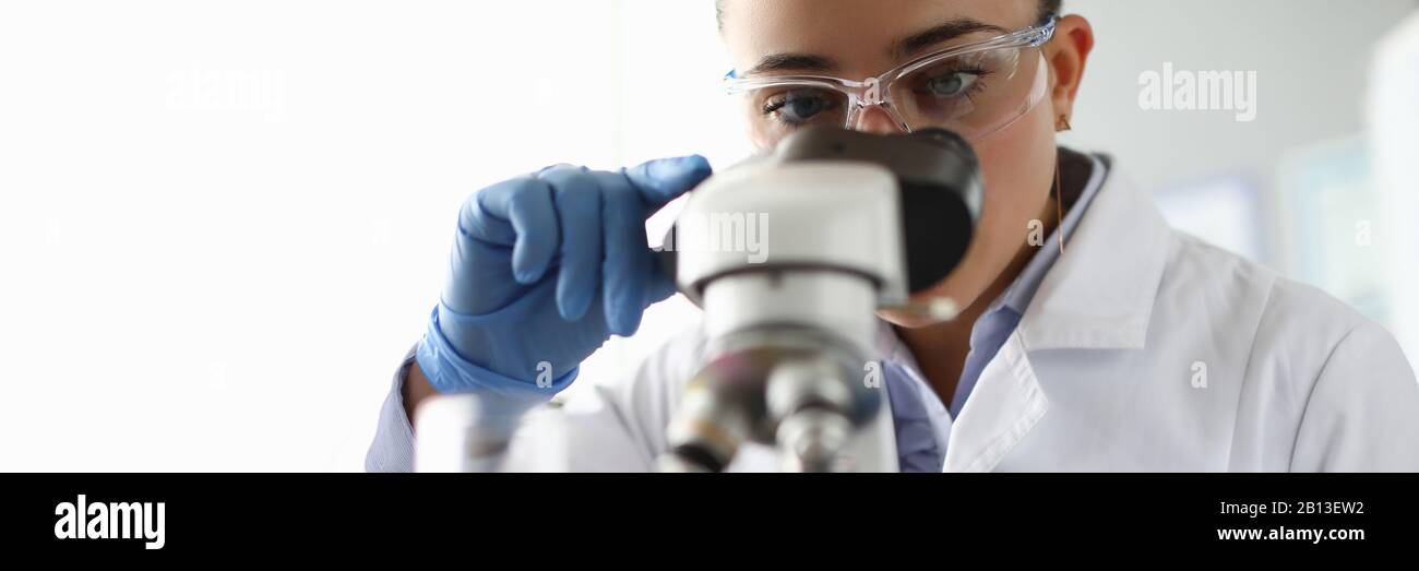 Biomedical analysis scientist making hi-res stock photography and ...
