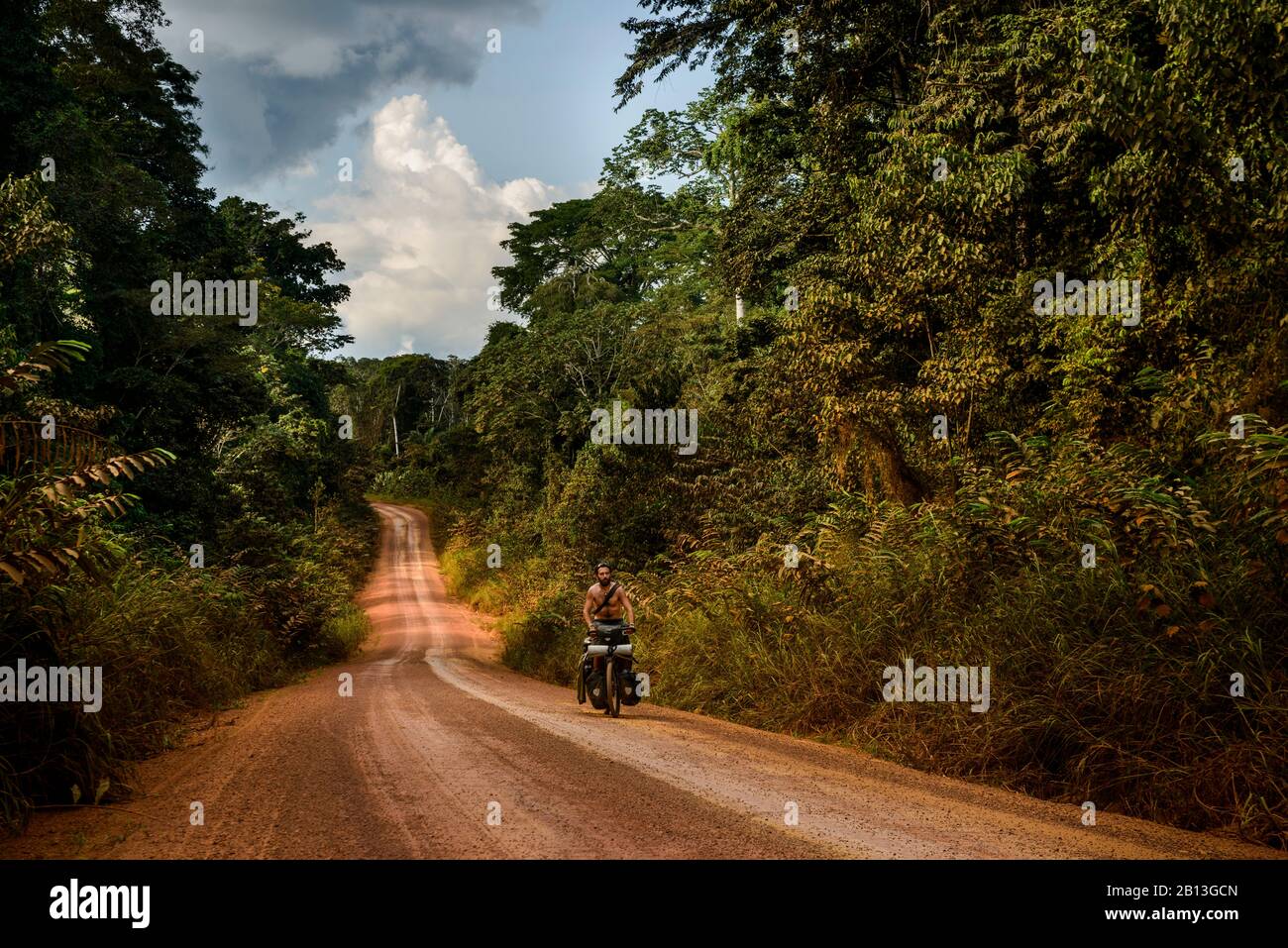 Cycling in the equatorial rainforest of Gabon,Central Africa Stock ...