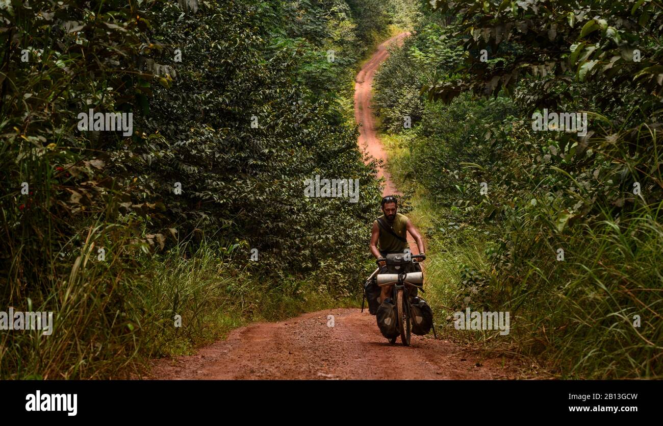 Cycling in the equatorial rainforest of Gabon,Central Africa Stock ...