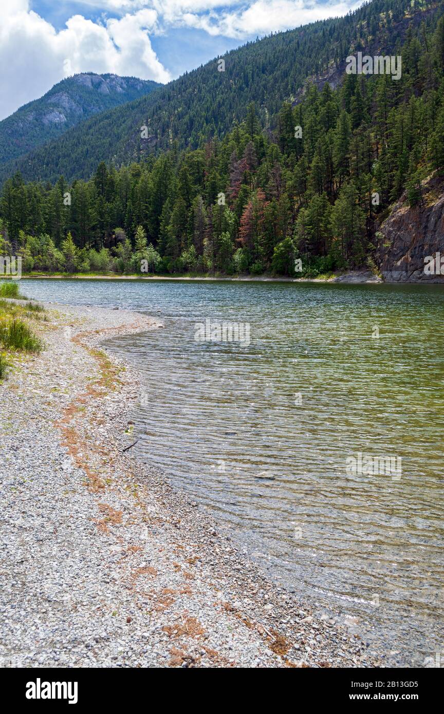 The shoreline of Crown Lake in Marble Canyon Provincial Park, British ...