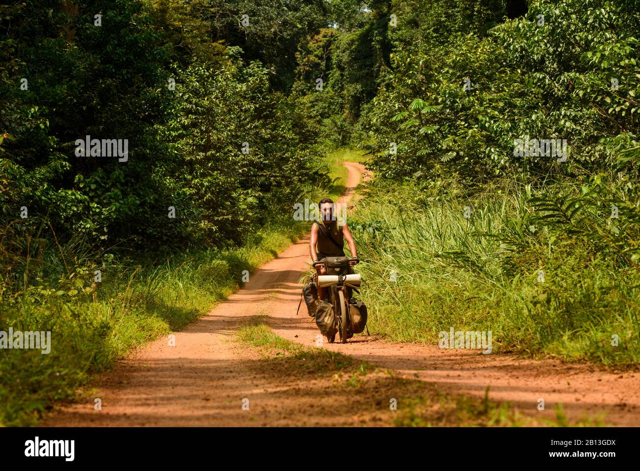 Cycling in the equatorial rainforest of Gabon,Central Africa Stock ...