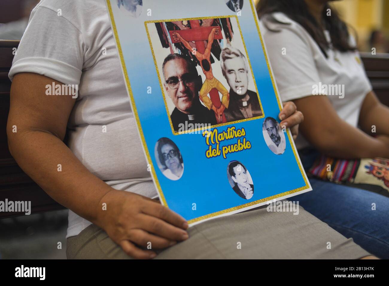 San Salvador, El Salvador. 22nd Feb, 2020. A woman holds a poster of ...