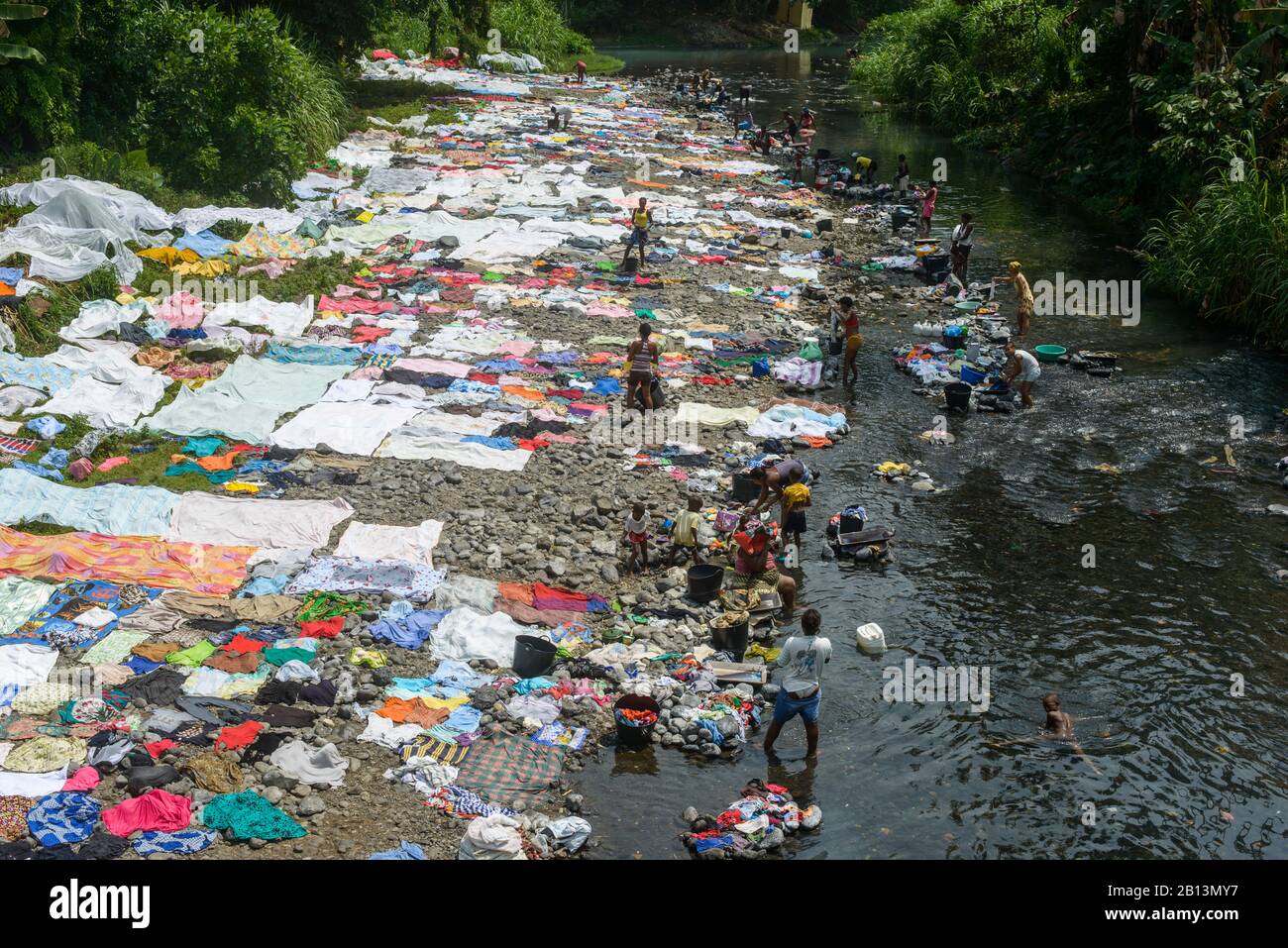 Washing clothes in river hi-res stock photography and images - Alamy