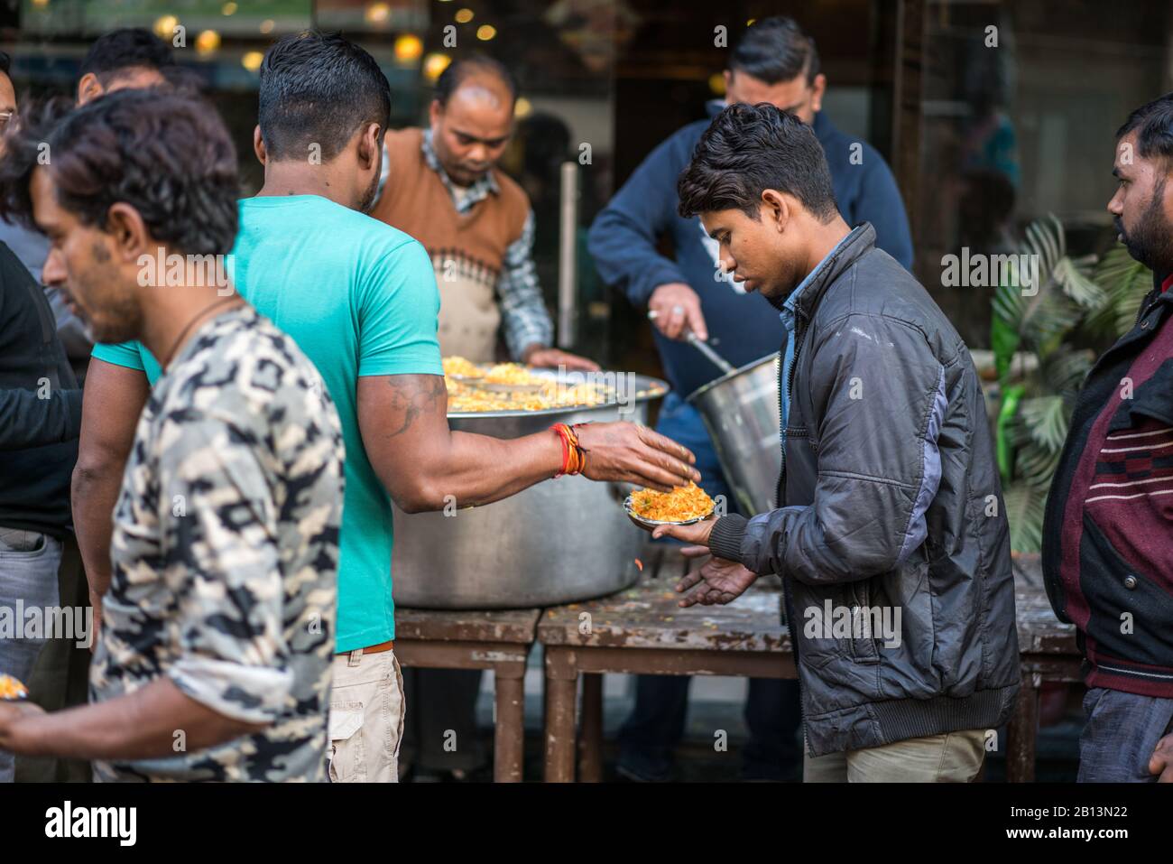 Free food for localpeople, New Delhi, India, Asia Stock Photo - Alamy