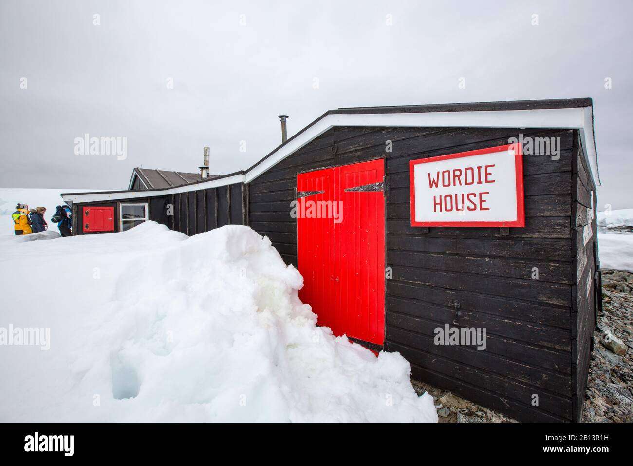 Tourists from an expedition cruise ship visiting Wordie House at old ...