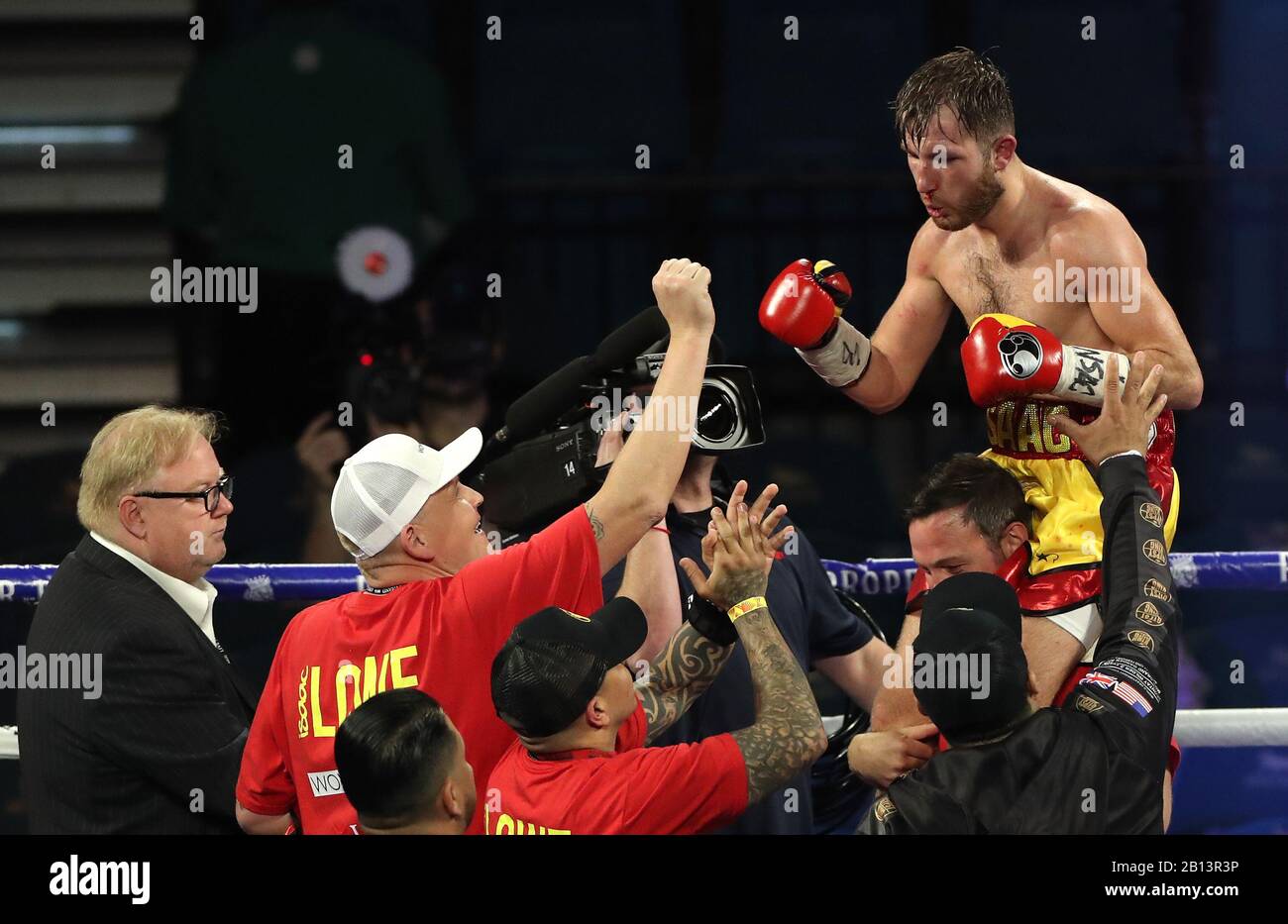 Isaac Lowe (right) celebrates victory against Alberto Guevara in the ...
