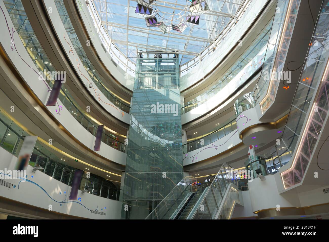The interior structure of a Chinese mall, transparent glass ceiling ...