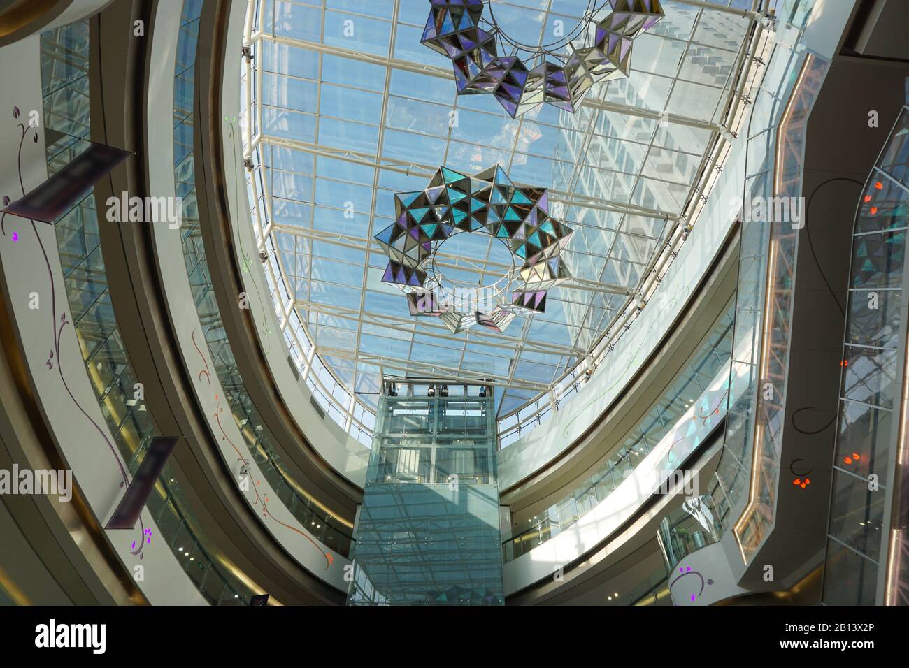 The interior structure of a Chinese mall, transparent glass ceiling ...