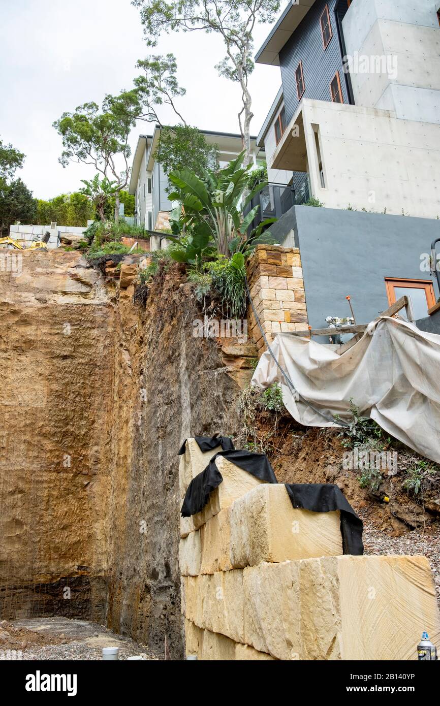 Australia, deep excavation in rock to construct a new luxury home in ...