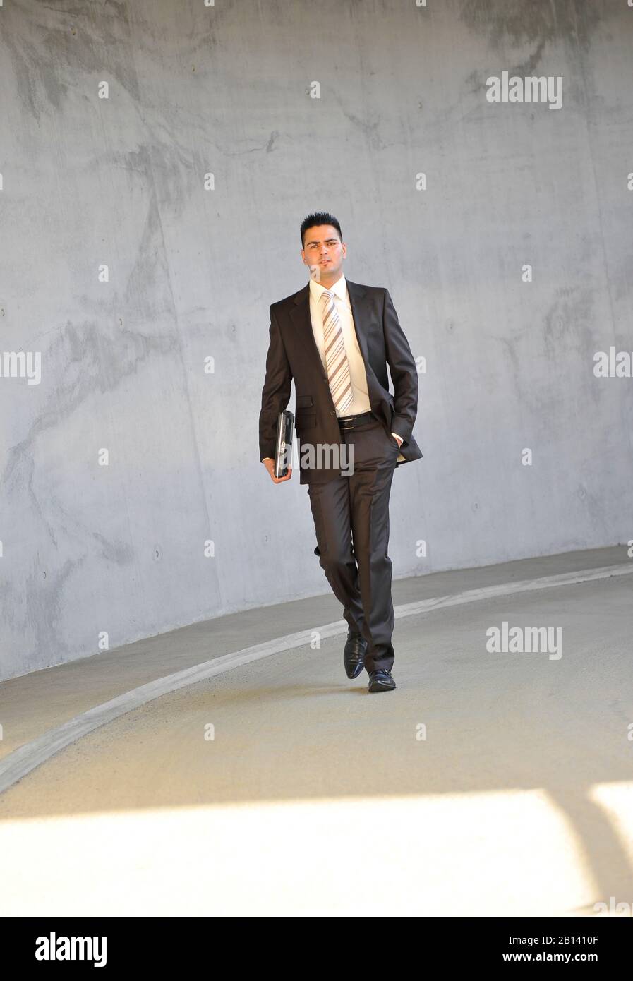 Business person walking towards camera hi-res stock photography and ...