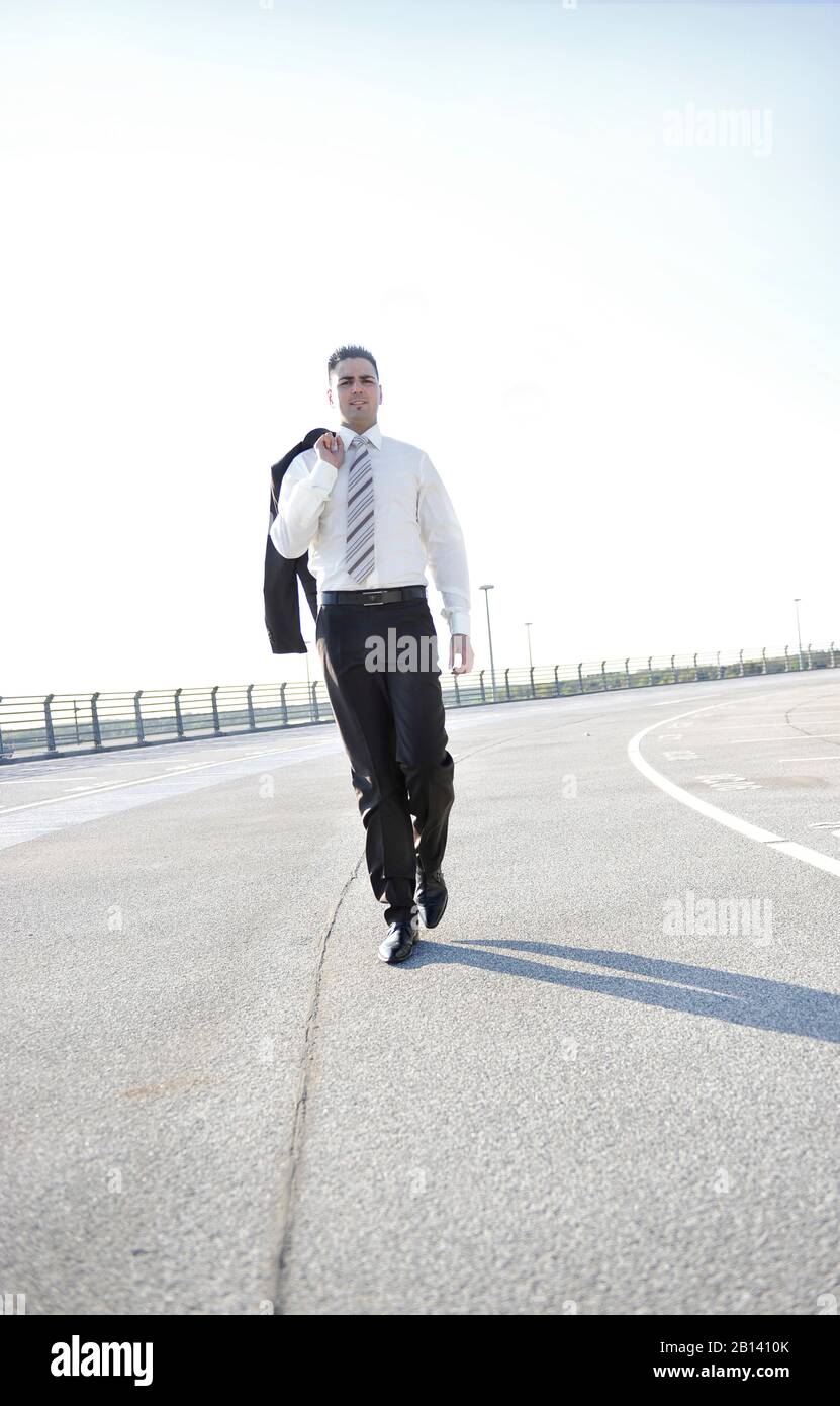 Business person walking towards camera hi-res stock photography and ...