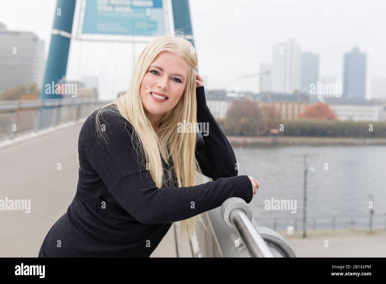 Woman young bridge stands hi-res stock photography and images - Alamy