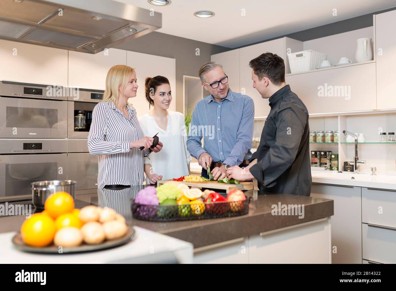 Cook gives a cooking class Stock Photo - Alamy