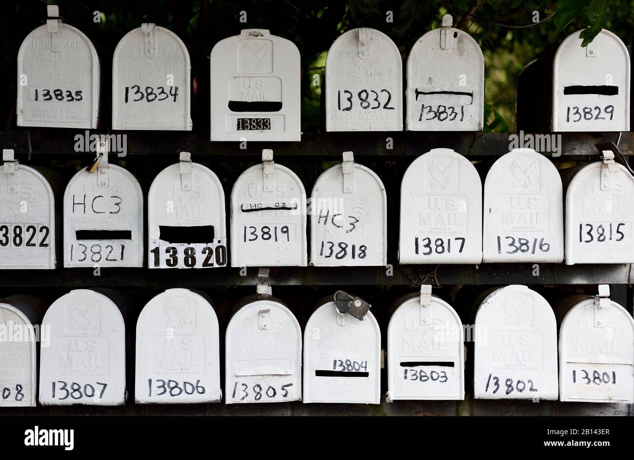 Several rows of white metal numbered United States post office ...